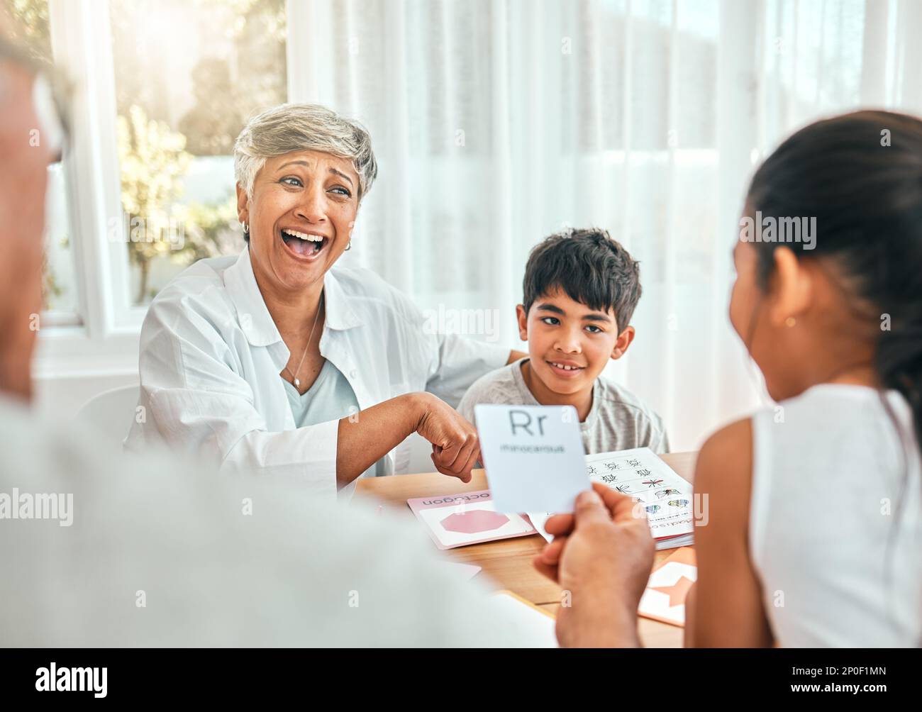 Education, cards and grandparents with children and letter lesson for ...
