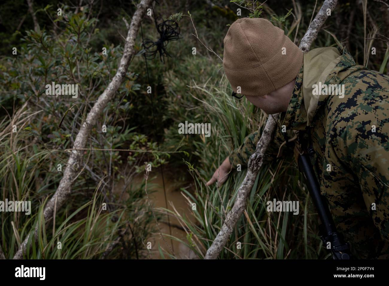 U.S. Marine Corps Lance Cpl. Isaac Peters, a water support technician ...