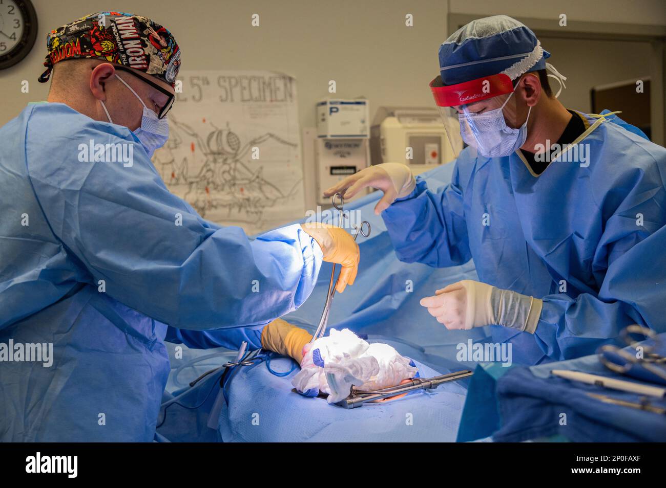 Instructors act as surgeons during a mock surgery while 68D operating ...
