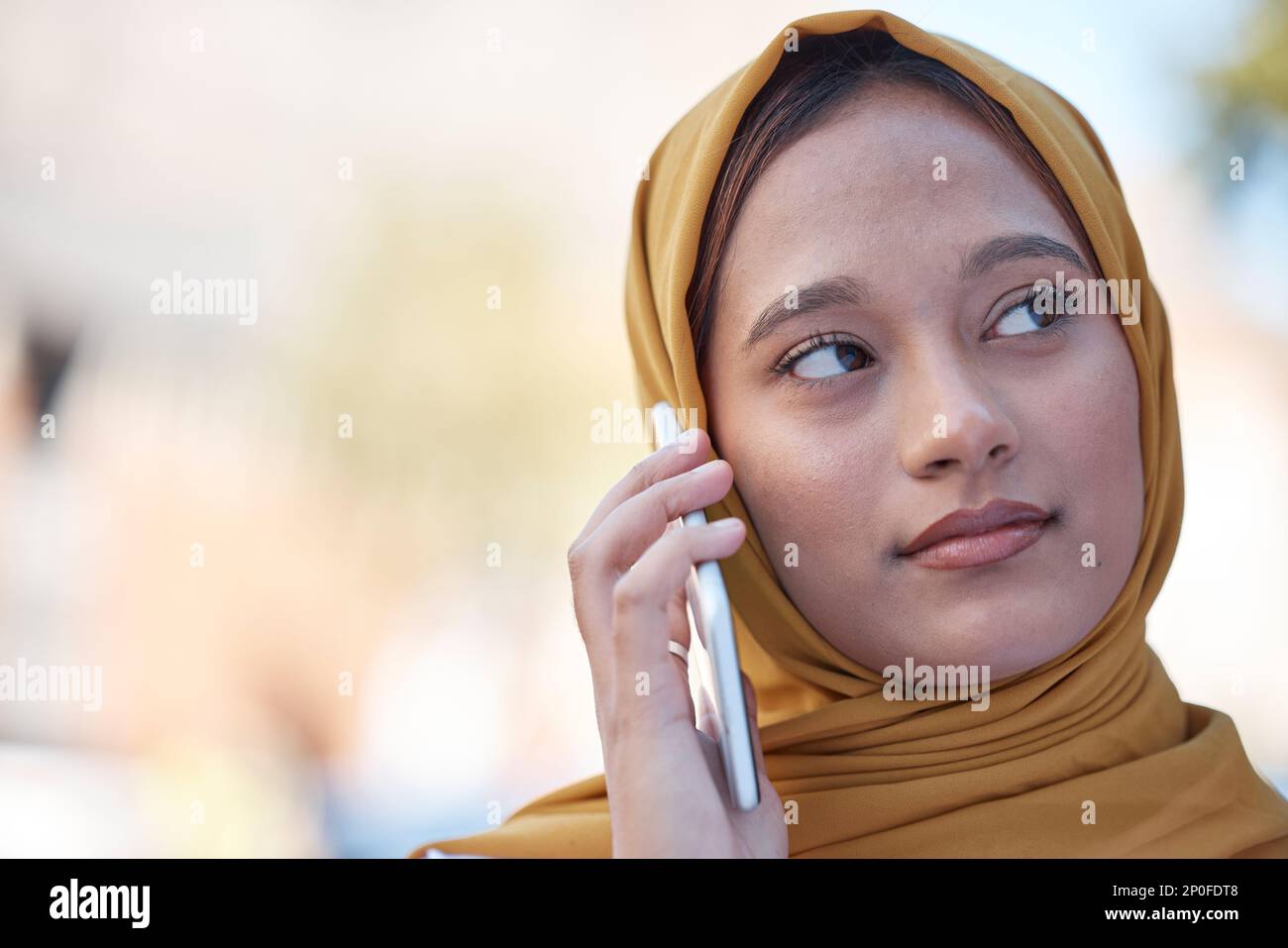 Muslim woman in city on a phone call, cellphone communication or 5g ...
