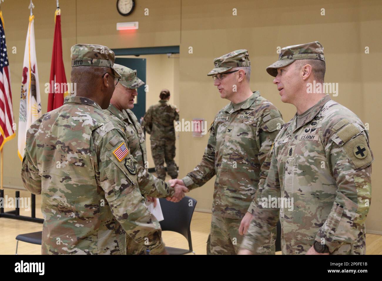 Col. Seth Hible of Winfield shakes hands with Col. Michael Eastridge ...