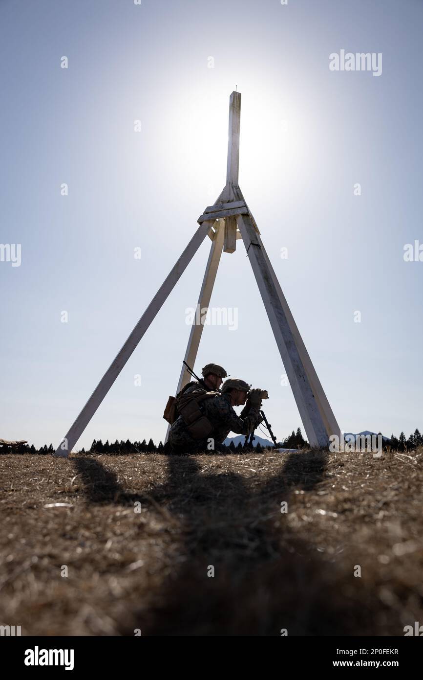U.S. Marine Corps Cpl. Sean Outhouse (left), a radio operator, and Cpl ...