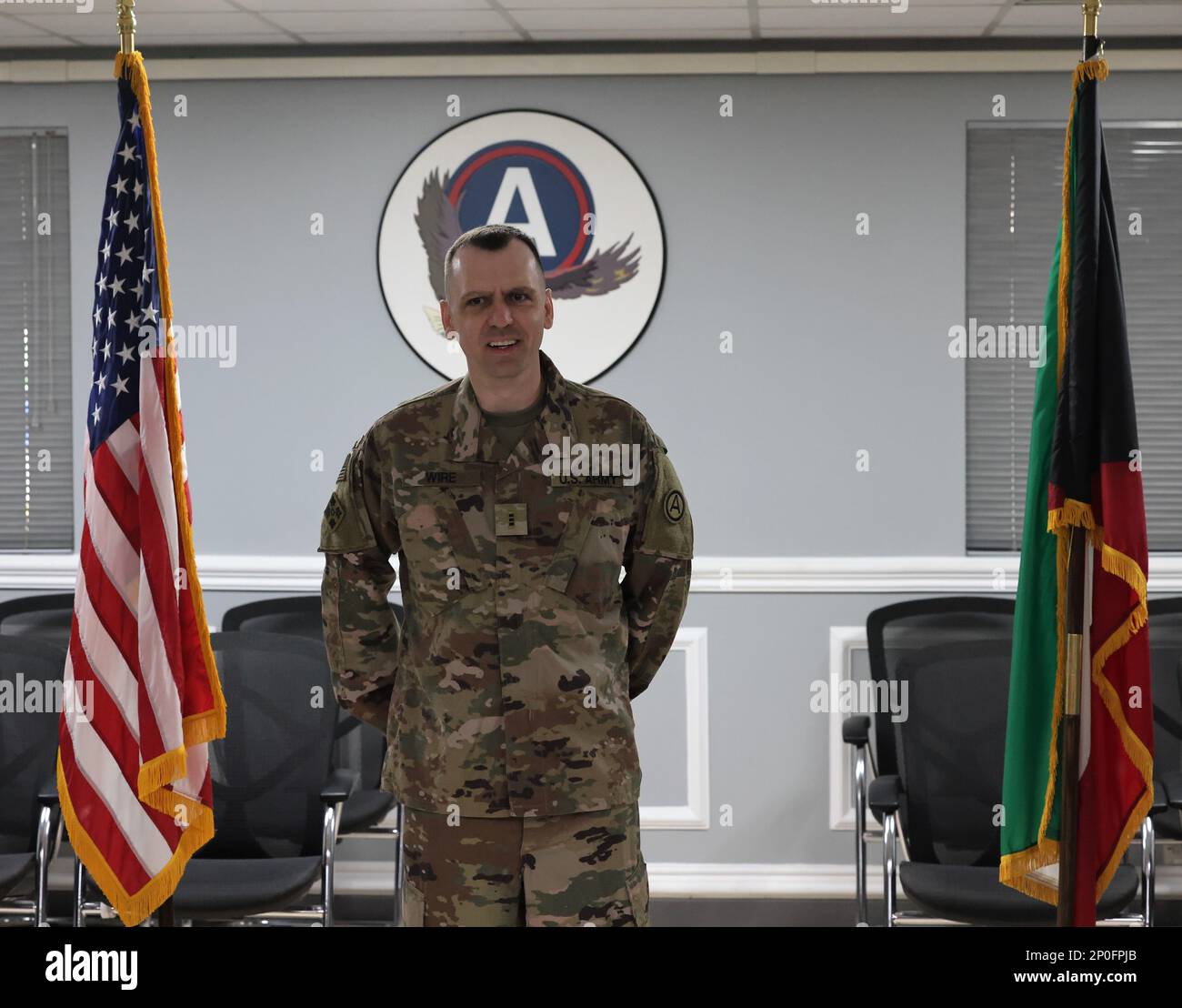 Mark Wire, of Area Support Group - Kuwait, gets promoted by Maj. Andrew ...