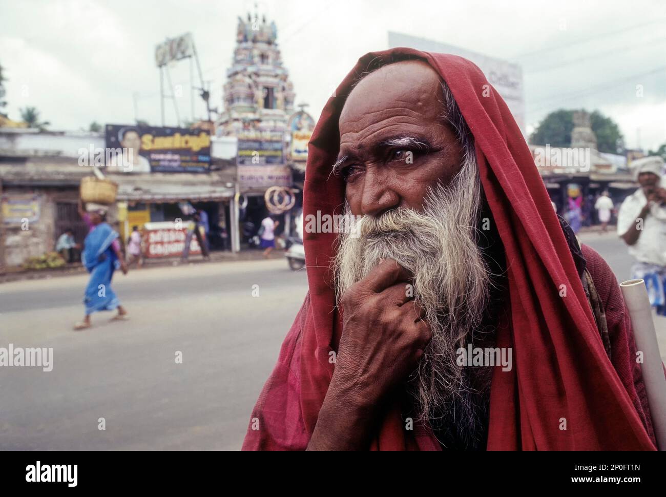 S. Narayanan, elderly male Hindu beggar standing on the street at ...