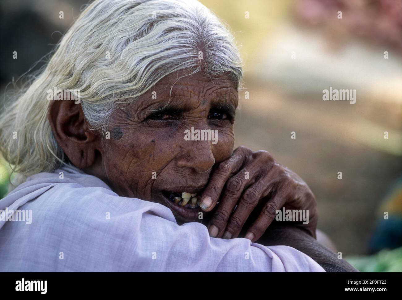 An old lady sitting at Anaikatty, Tamil Nadu, India Stock Photo - Alamy