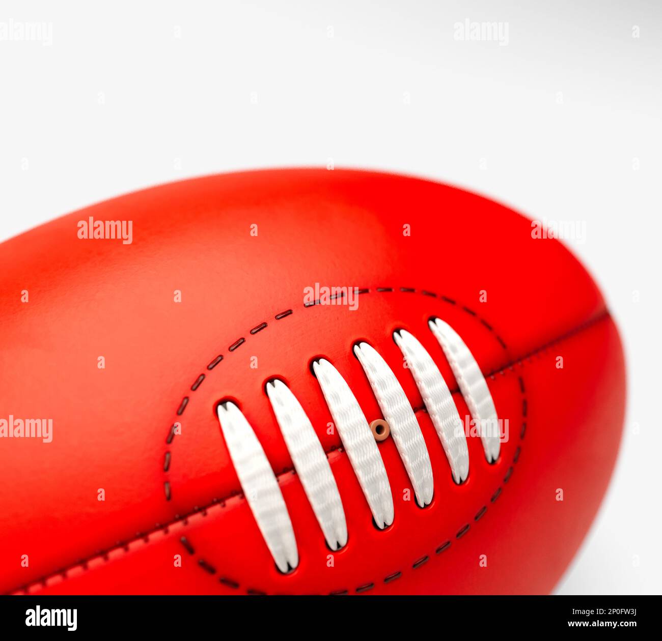 A generic unbranded aussie rules football ball on an isolated studio ...