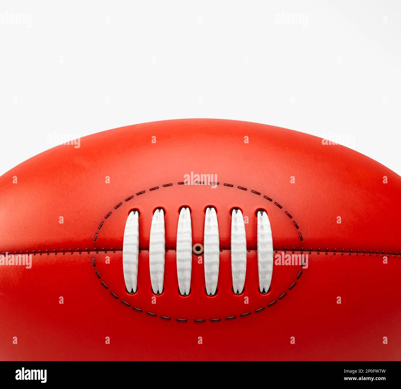 A generic unbranded aussie rules football ball on an isolated studio ...