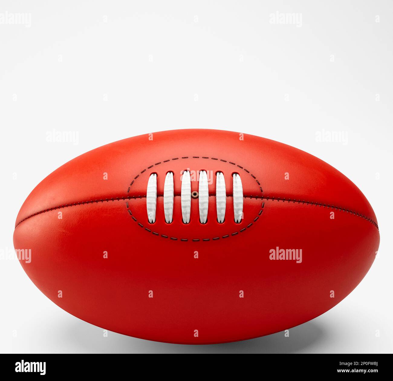 A generic unbranded aussie rules football ball on an isolated studio ...