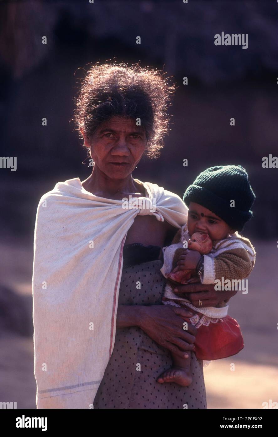 Jenu Kurumba lady with her babe in Bandipur, Karnataka, India Stock ...