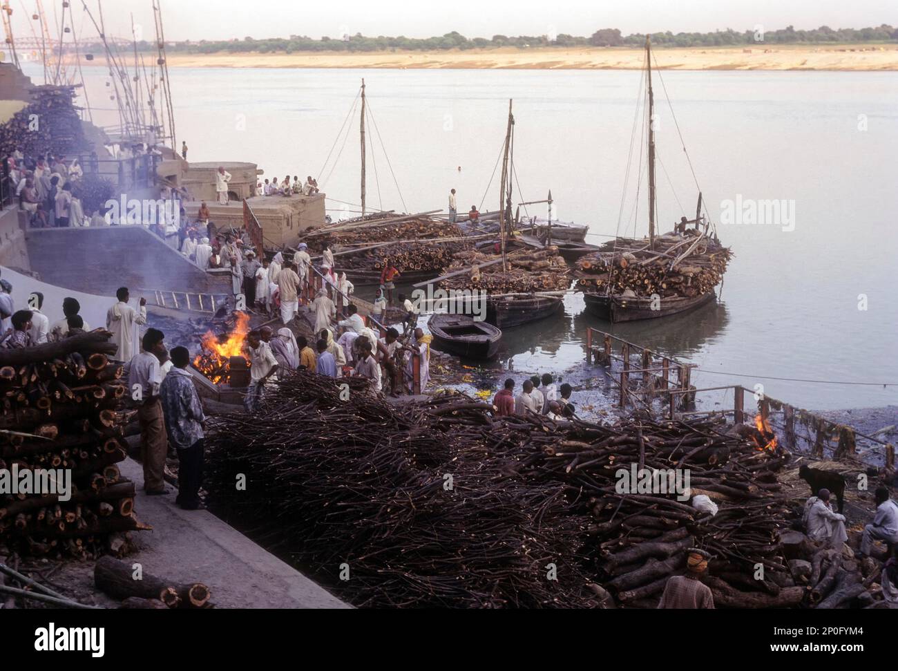 The rite of cremations in Manikarnika Ghat on banks of holy Ganges ...