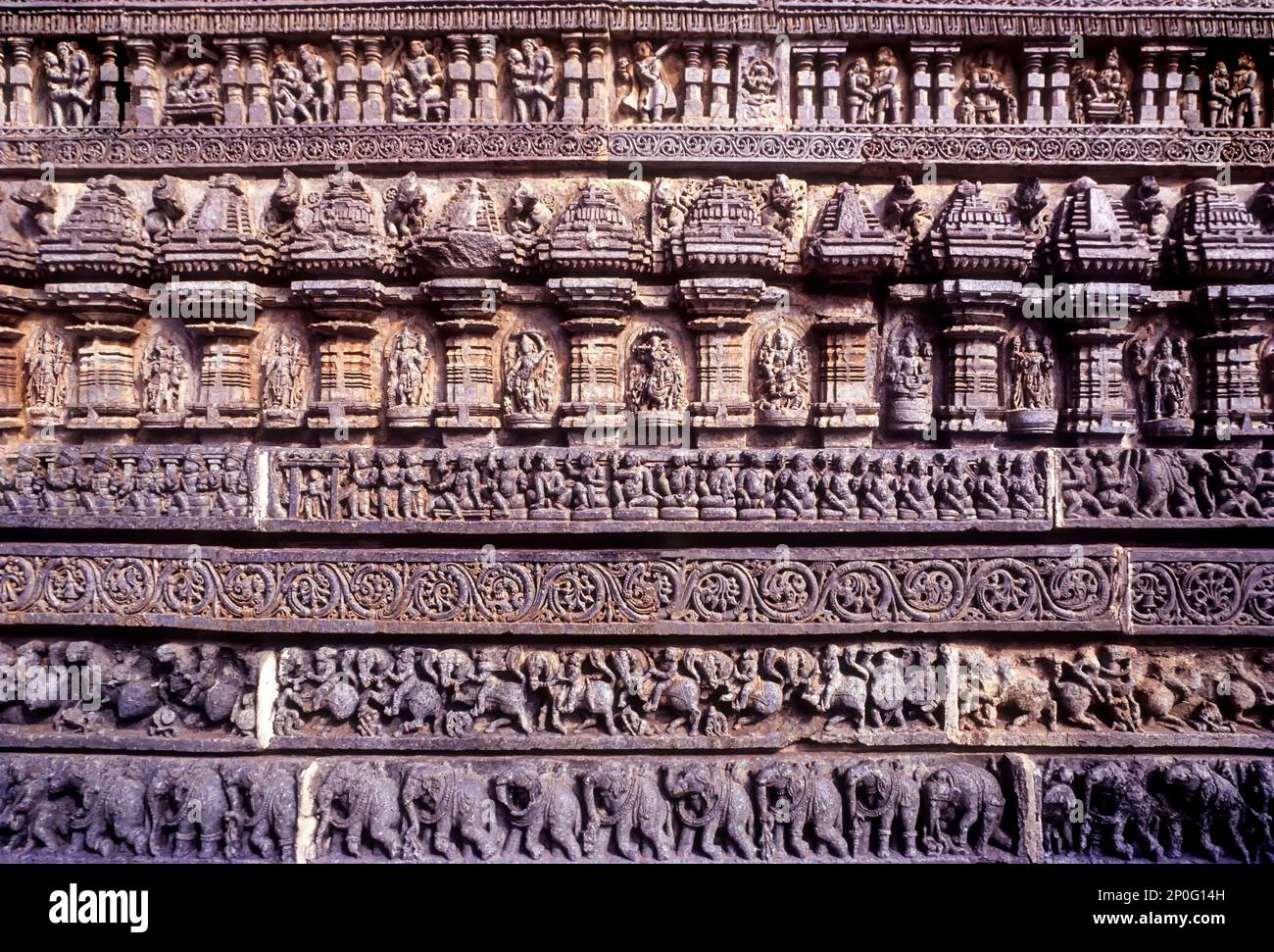 Bands of friezes cover the exterior walls of the Chennakesava temple ...
