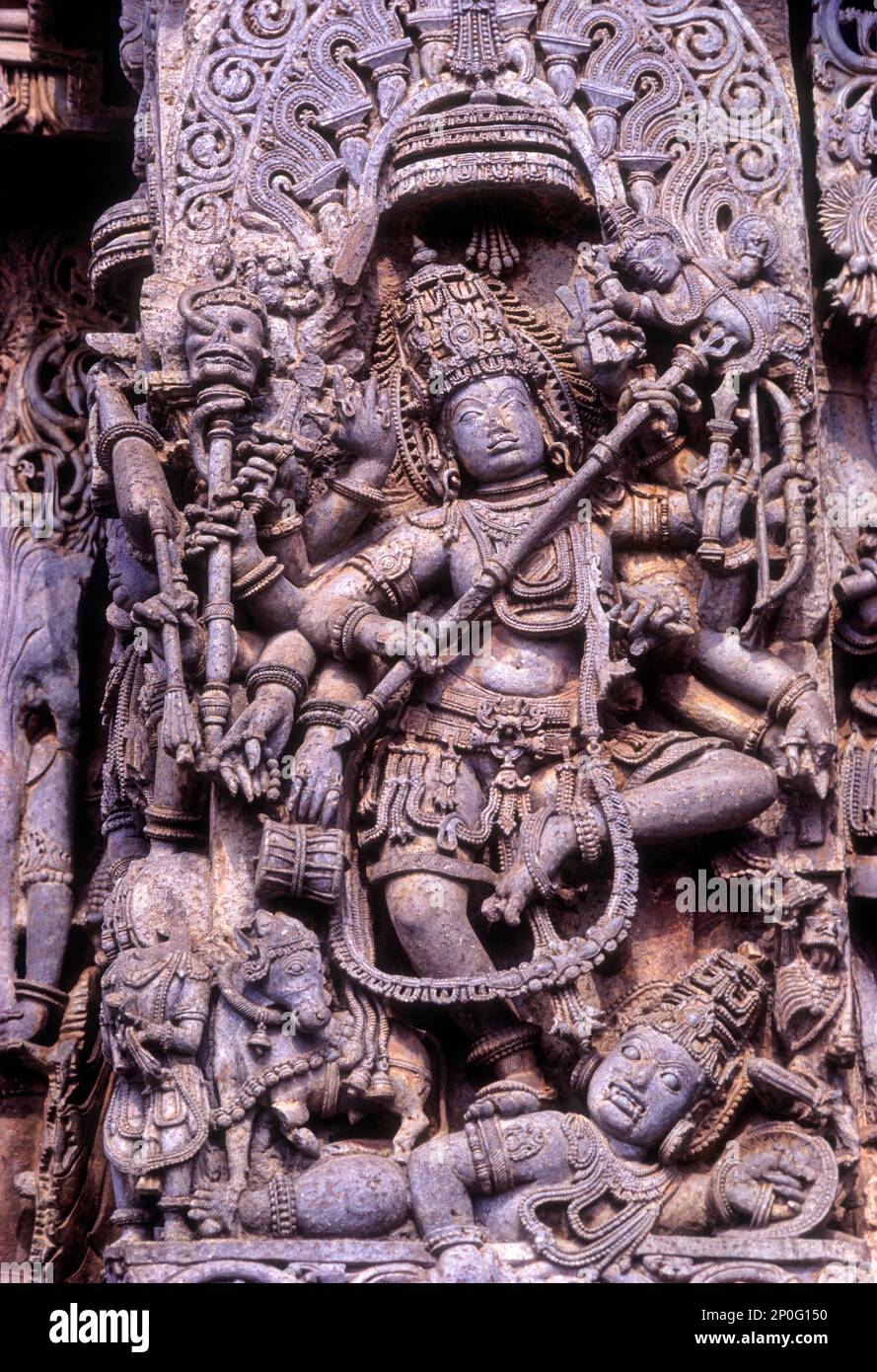 Siva killing Andhakasura, Sculpture in 12th century Hoysaleswara temple ...