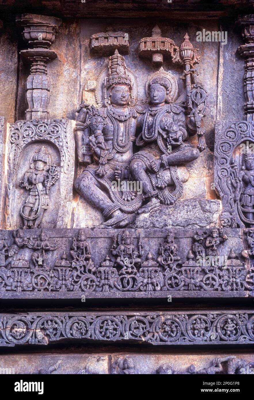 12th century King Vishnuvardhana with his wife Shantala Devi sculptures ...