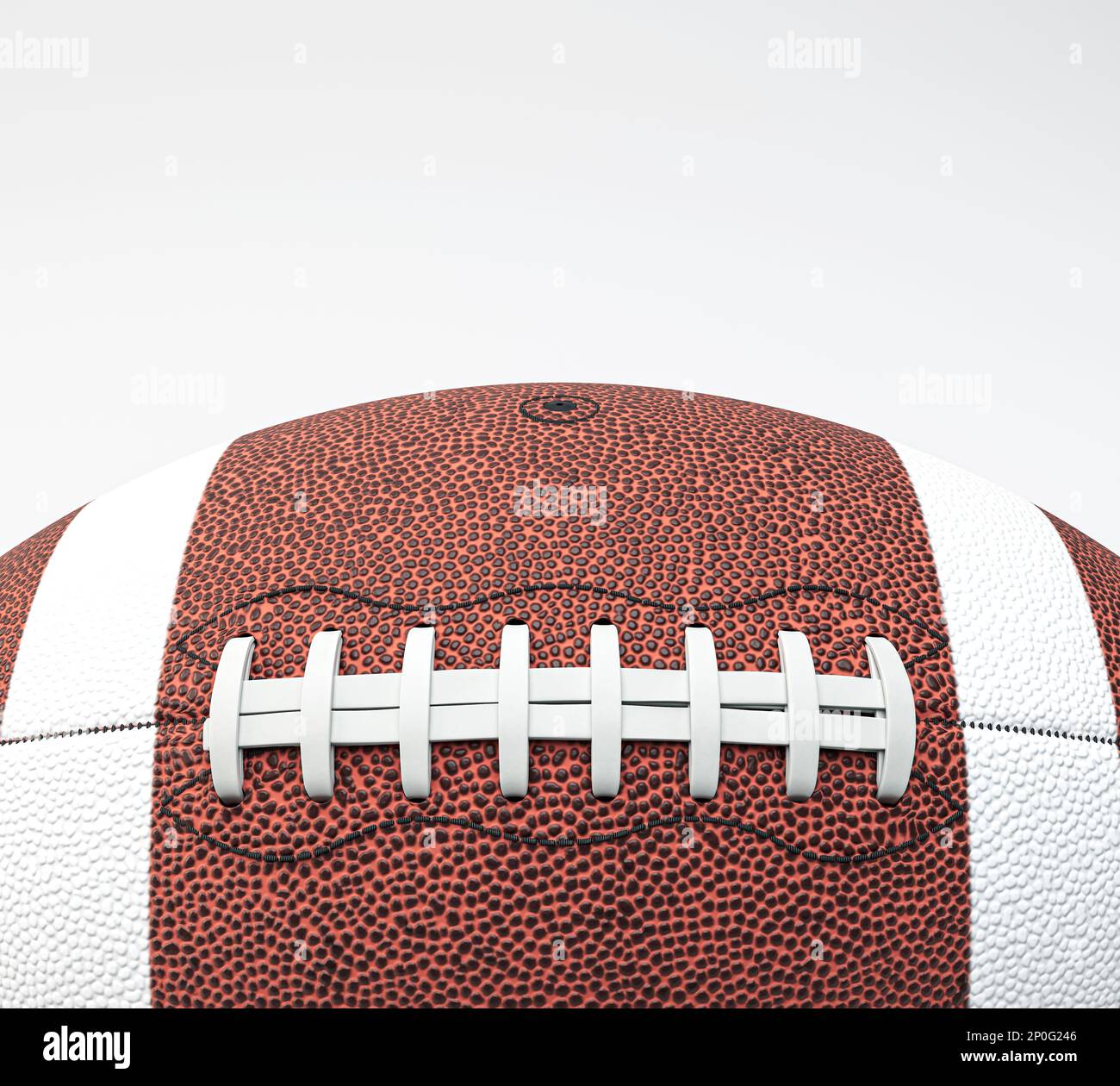 A generic unbranded american football ball on an isolated studio ...
