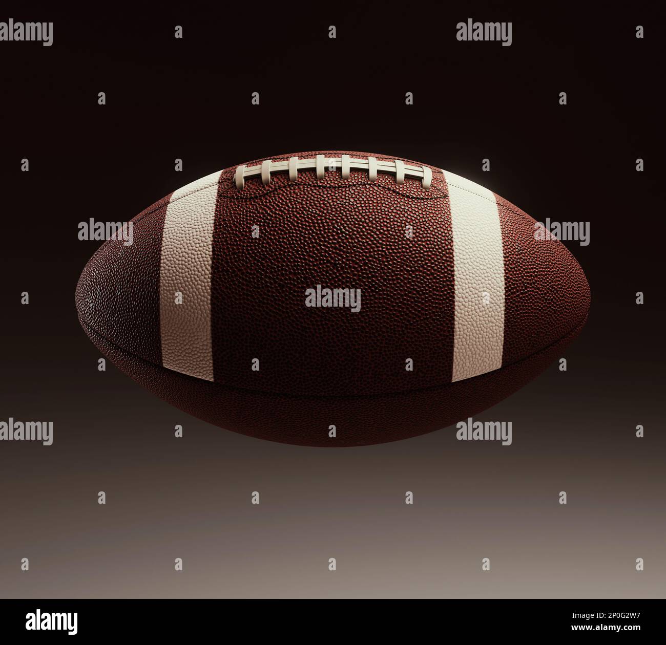 A generic unbranded american football ball on an isolated studio ...