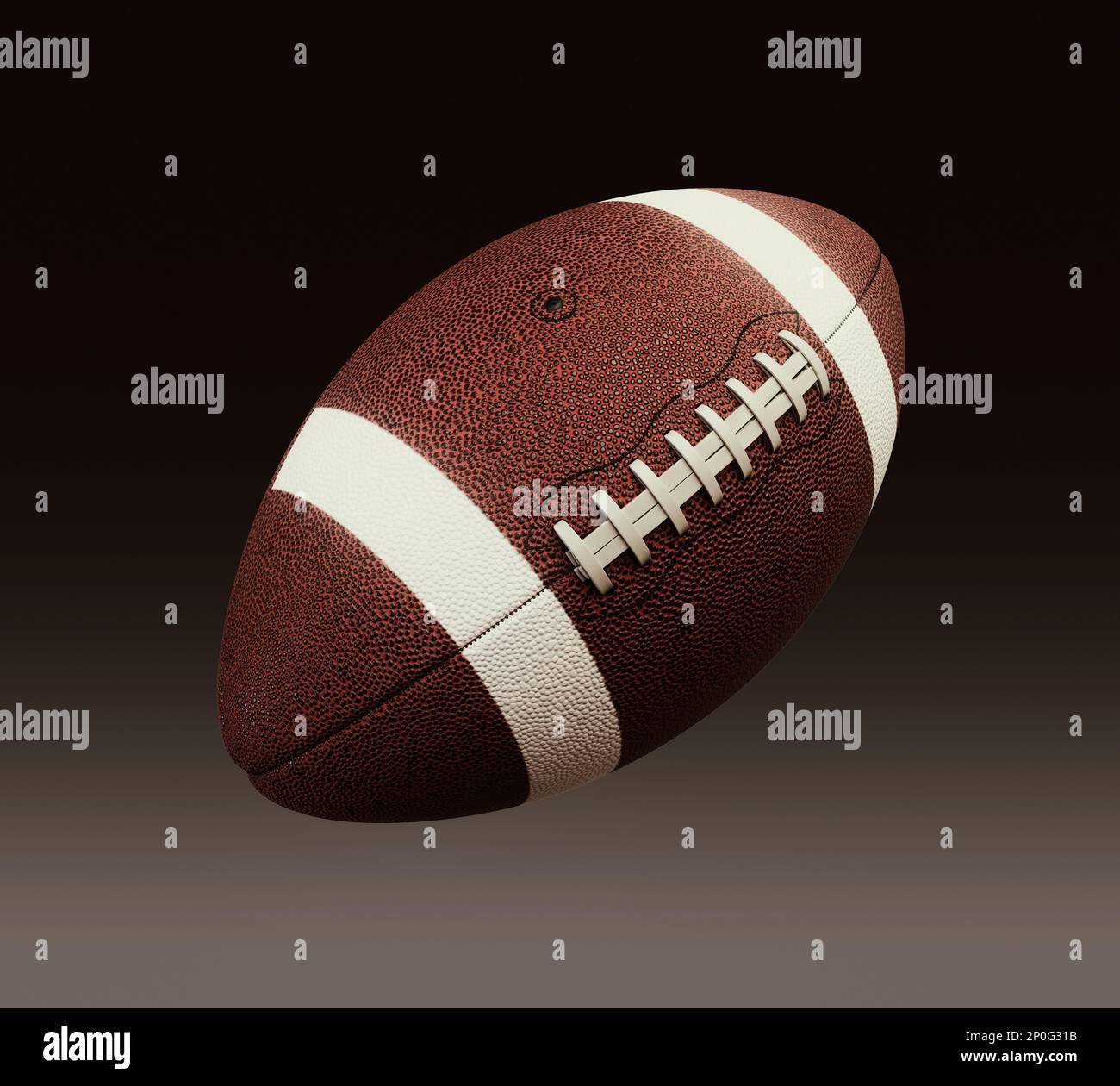 A generic unbranded american football ball on an isolated studio ...