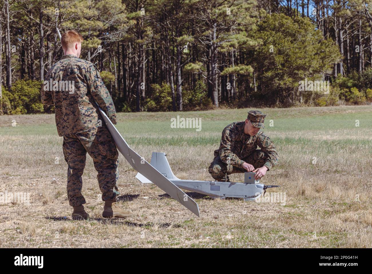 U.S. Marine Corps Cpl. Jacob Youngblood, left, and Cpl. Sean Curran ...