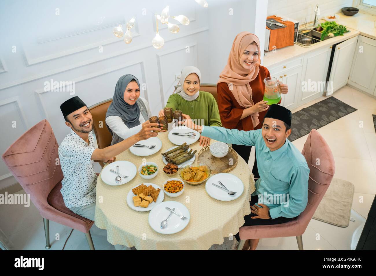 top view of family cheers with glasses breaking the fast Stock Photo ...