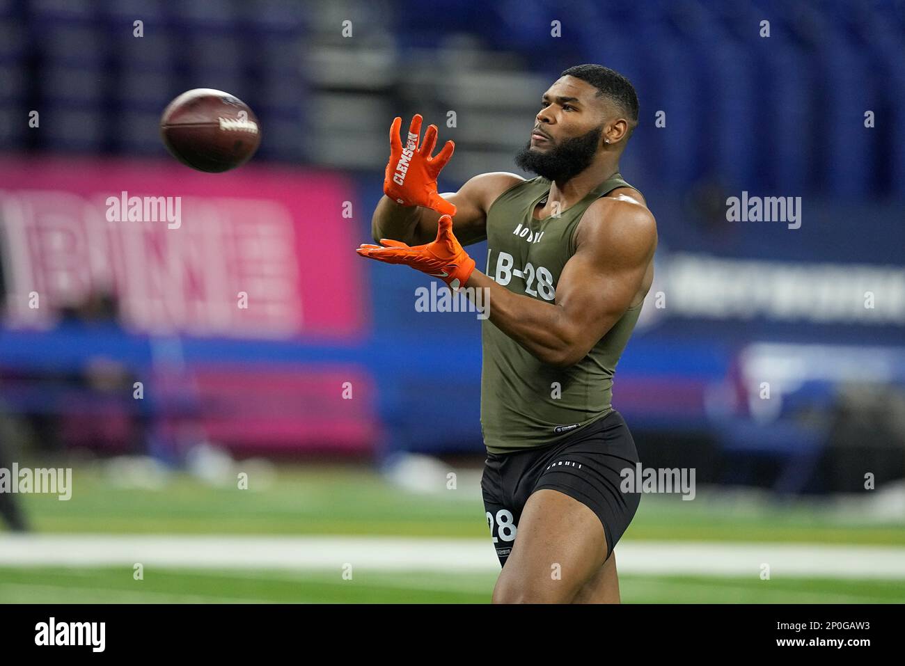 Georgia Tech linebacker Charlie Thomas runs a drill at the NFL football ...