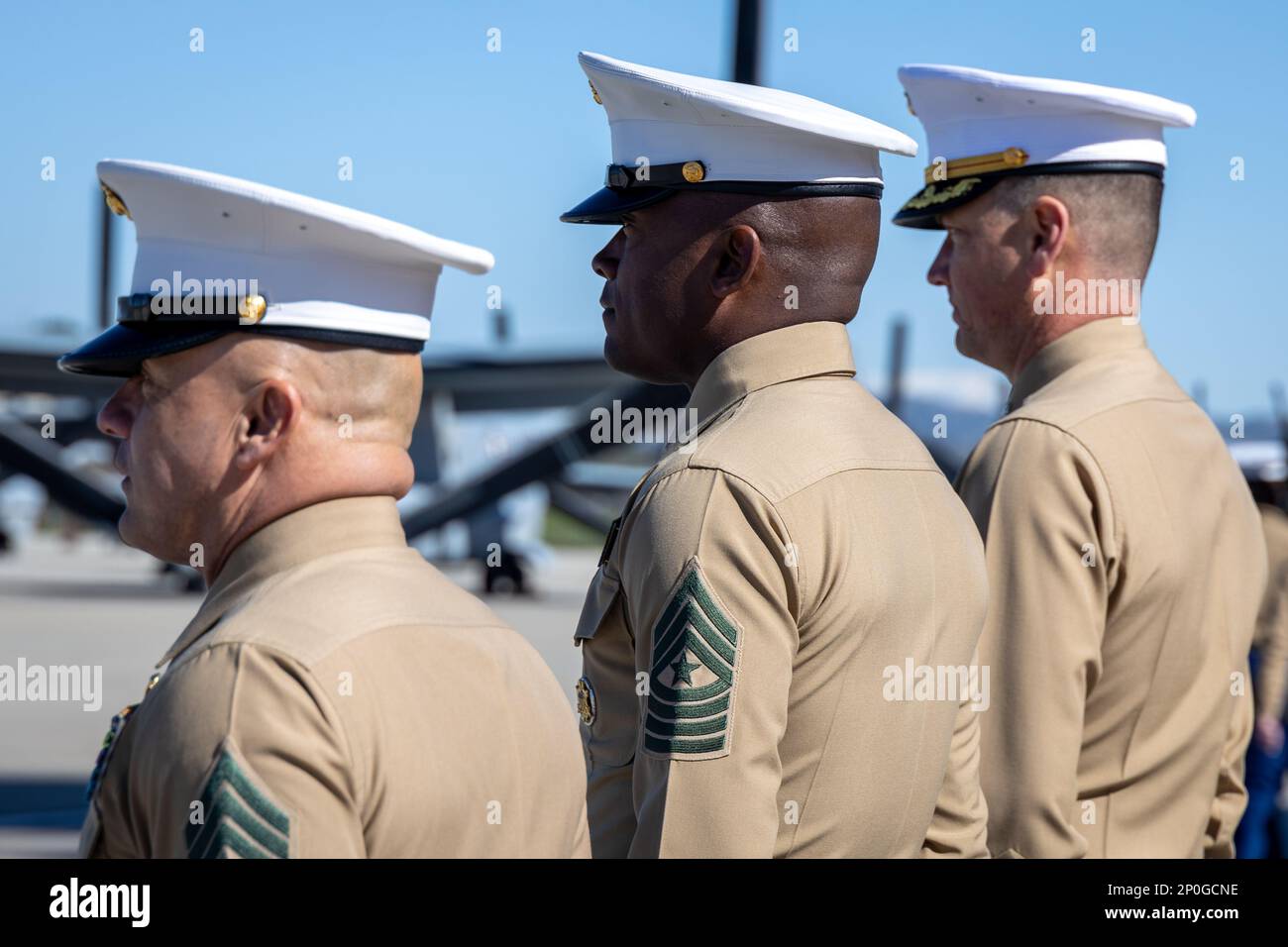 U.S. Marine Corps Sgt. Maj. David Gonzalez, left, the outgoing sergeant ...