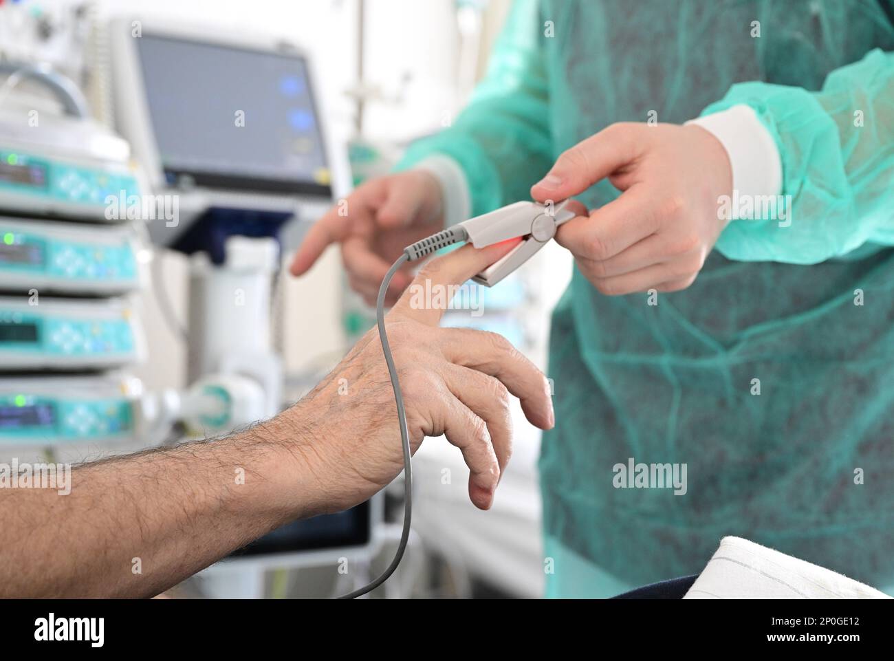 Stuttgart, Germany. 14th Feb, 2023. A nurse applies a measuring device ...