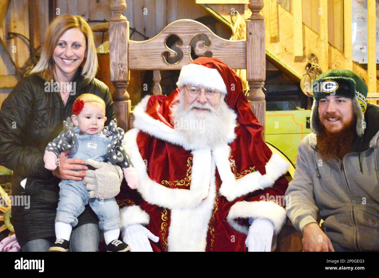 The Mills family gets photographs taken with Santa at Pioneerland on ...