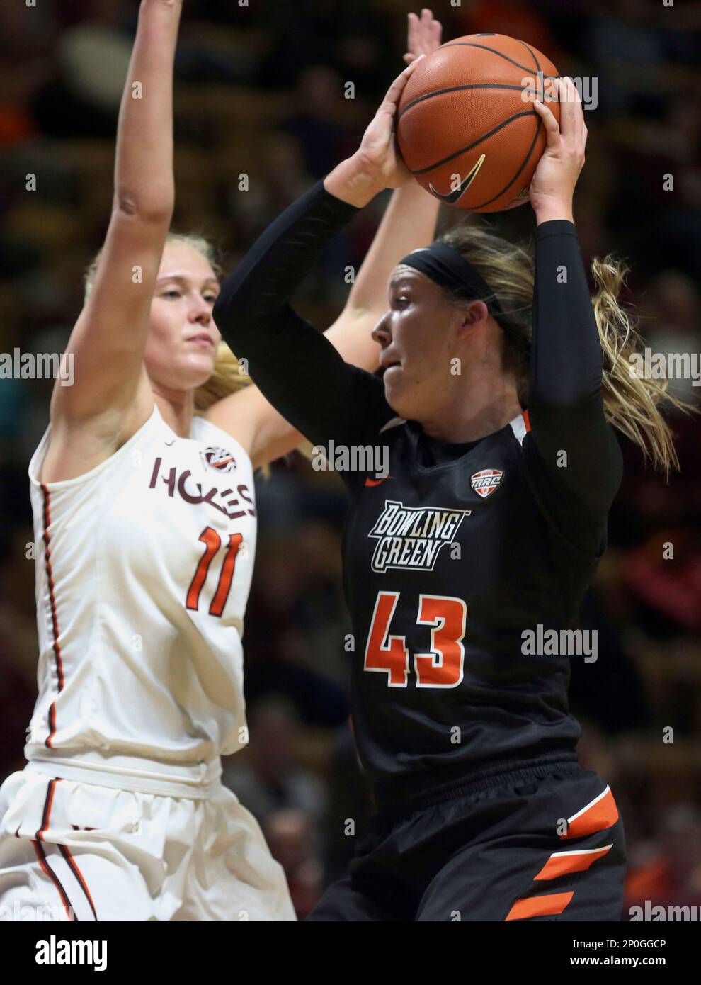 Virginia Tech's Regan Magarity (11) guards Bowling Green's Abby Siefker ...