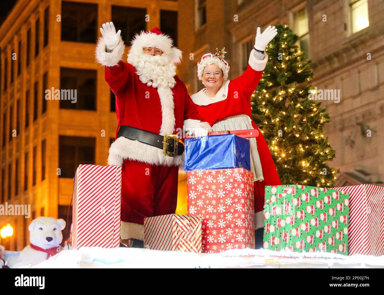 Santa and Mrs. Claus wave to the crowd during Huntington's annual ...