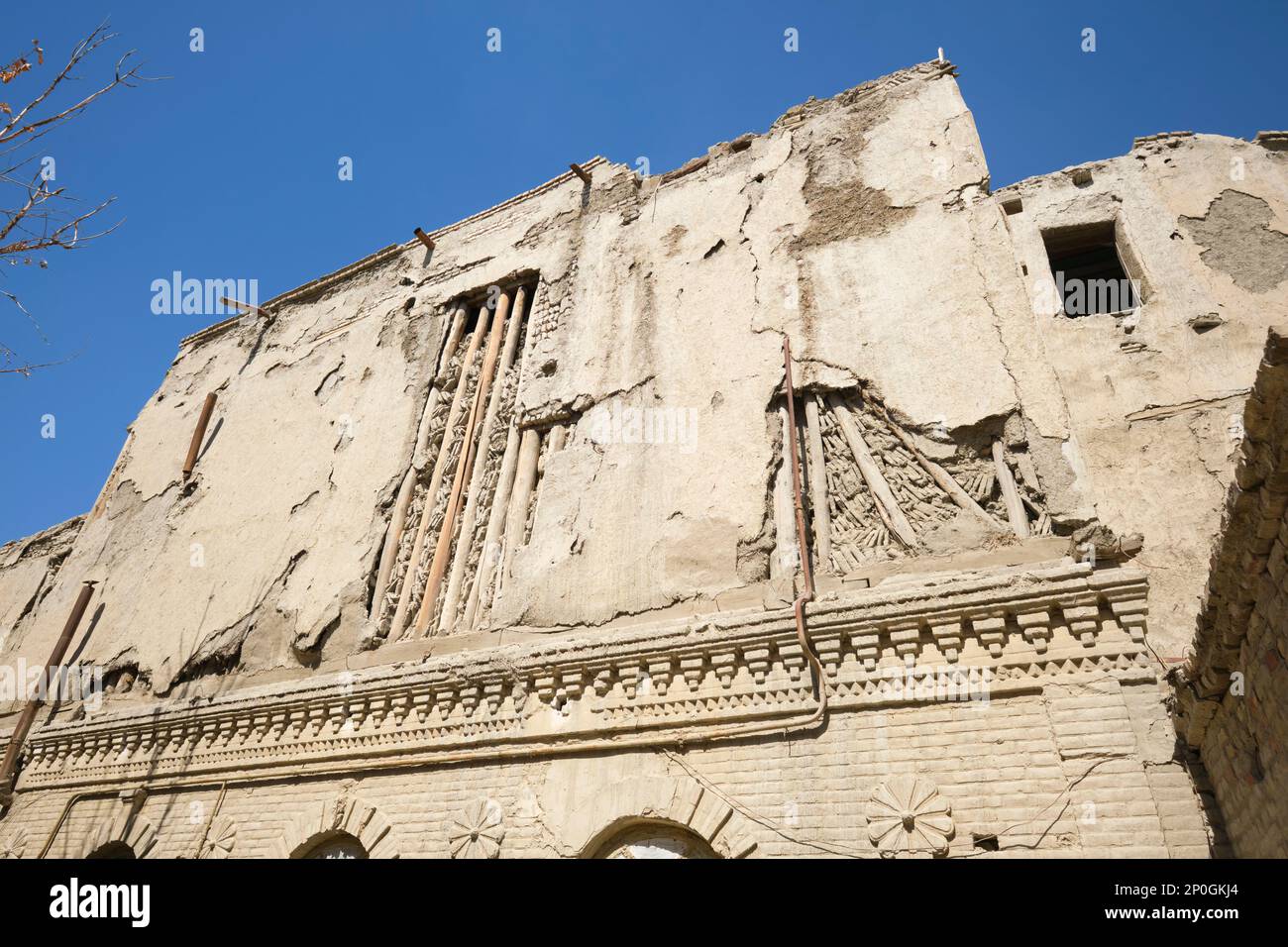 Wall detail, showing materials used. Sticks, wood columns, straw, mud ...