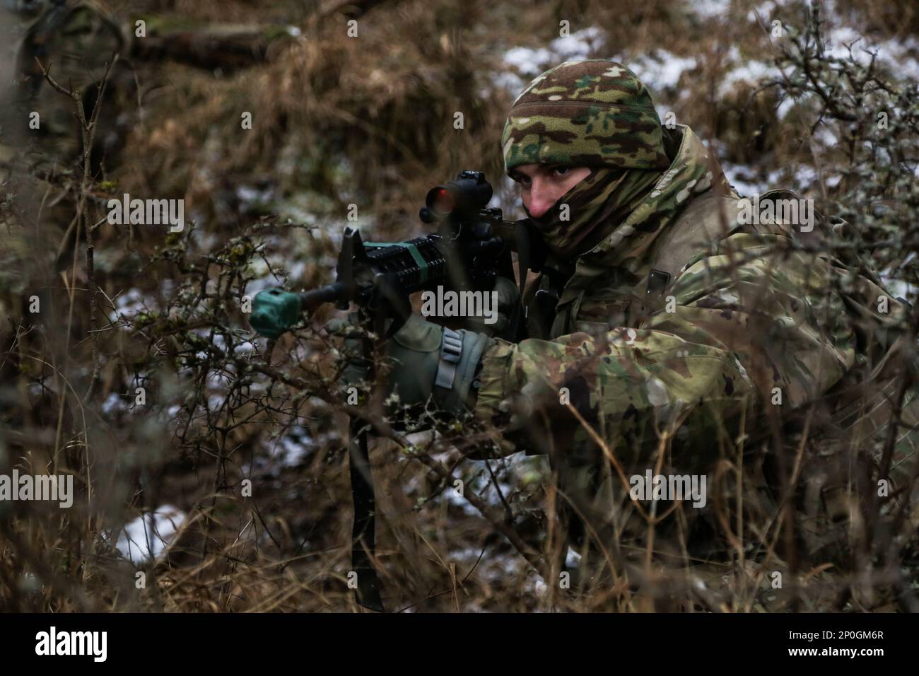 U.S. Army Pfc. William Conard, assigned to the 2d Cavalry Regiment ...