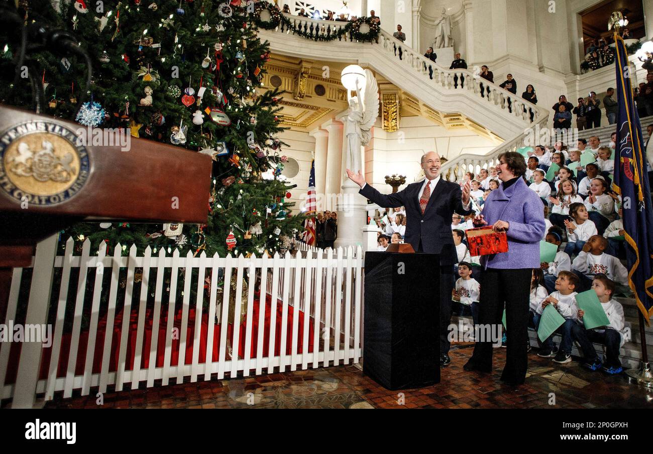 Guests join Gov. Tom Wolf and First Lady Frances Wolf as they light the ...