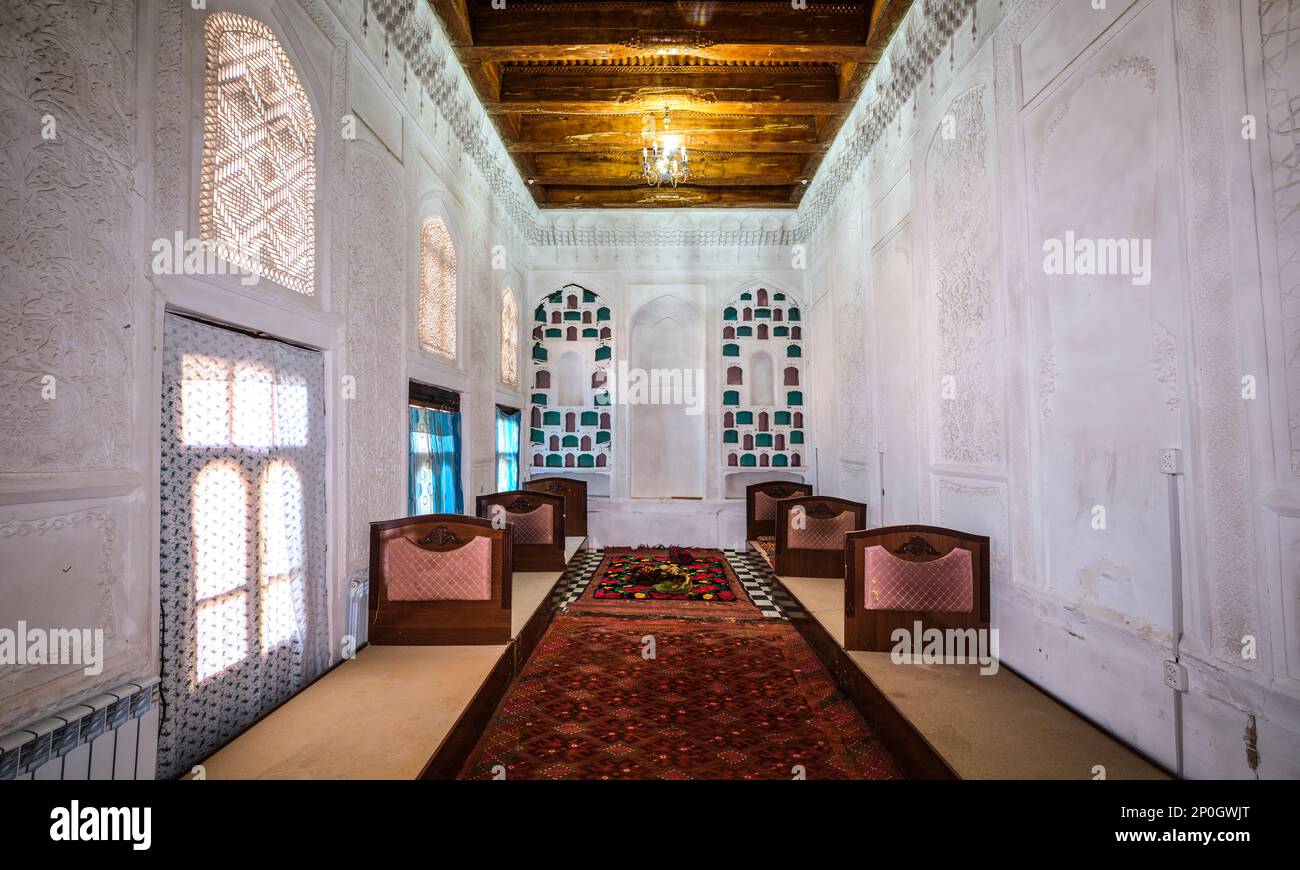 A grand receiving, living room, now used as a group bedroom at a hostel ...