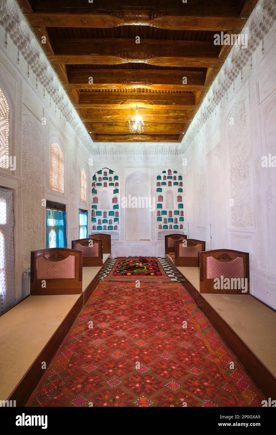 A grand receiving, living room, now used as a group bedroom at a hostel ...