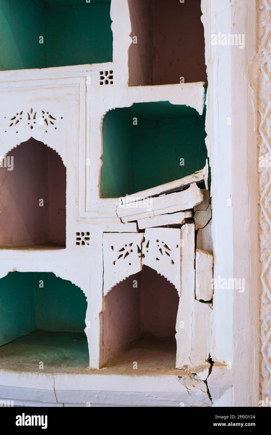 Detail of the wood, plaster case, cutout work, now broken and cracked ...