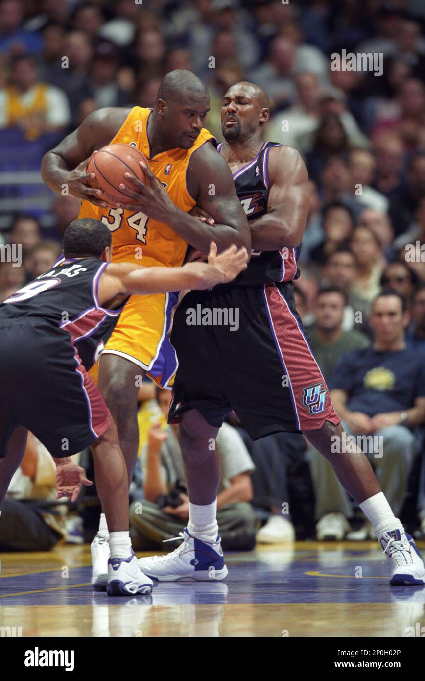 FILE: Shaquille O'Neal of the Los Angeles Lakers with the ball as Karl ...