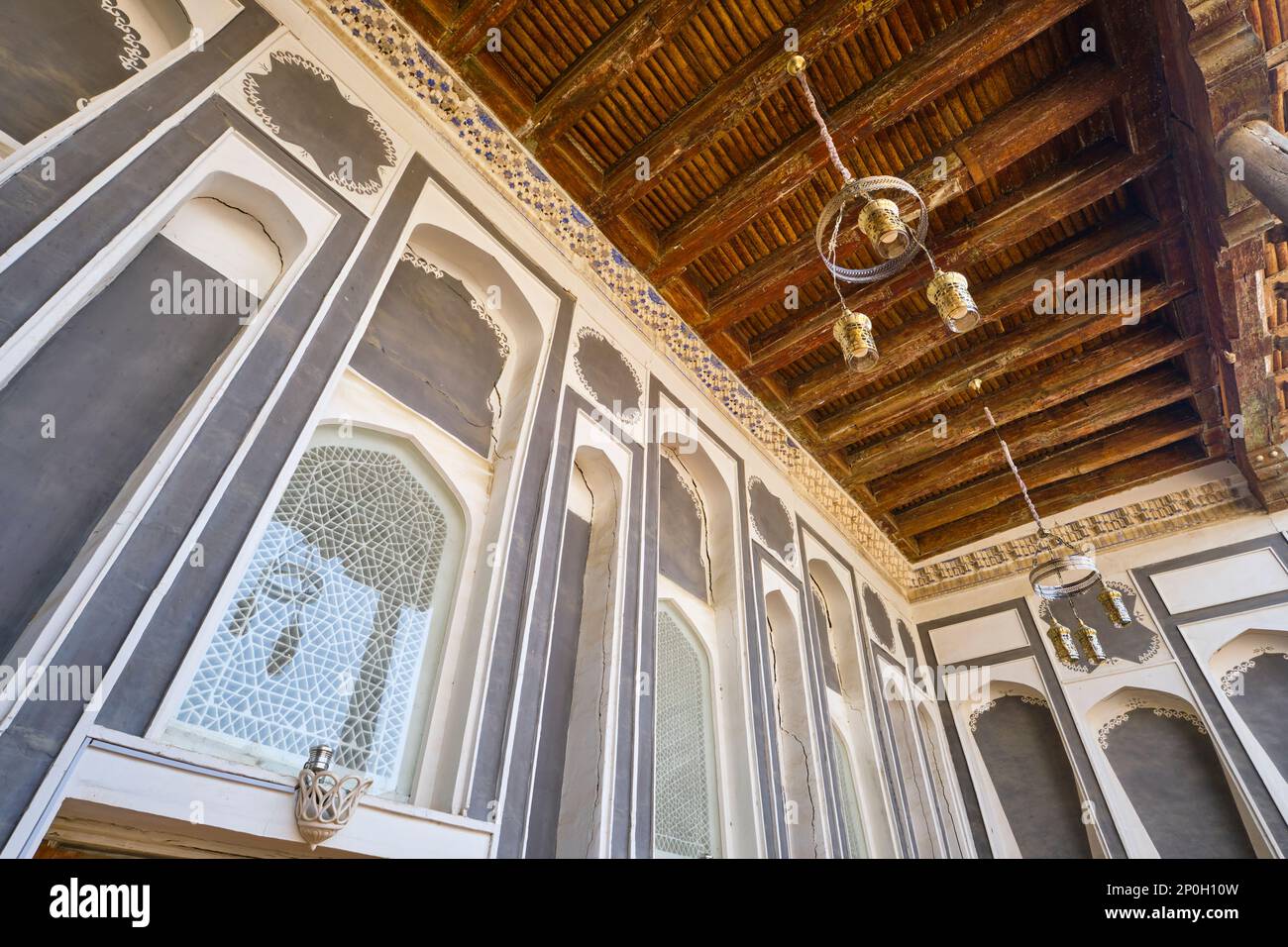 Detail view of the porch with wood carved ceiling and chandelier, added ...
