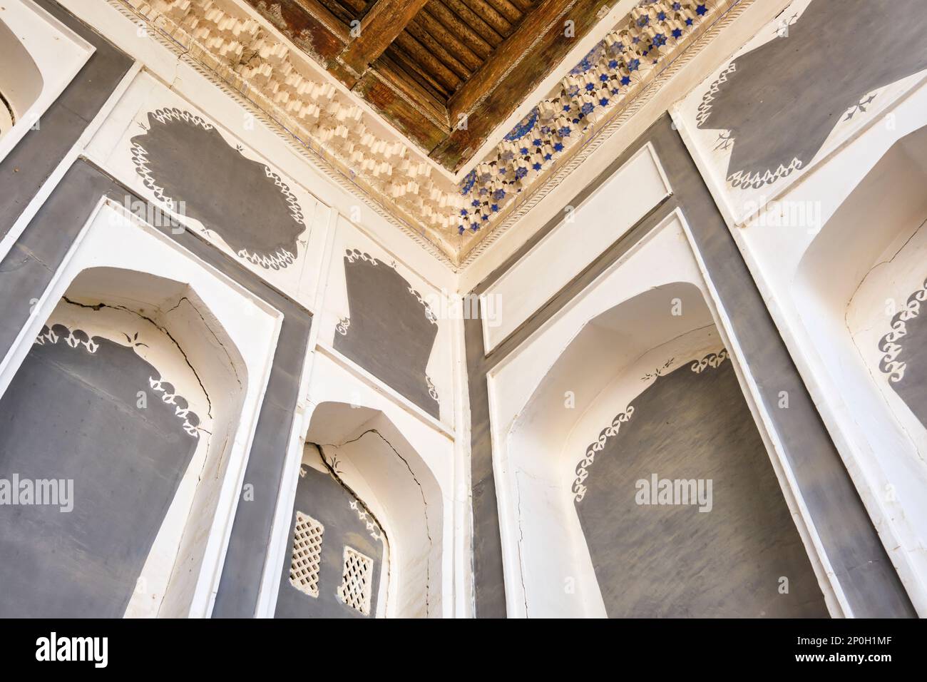 Detail view of the porch, added gray paint. At an old, historic ...
