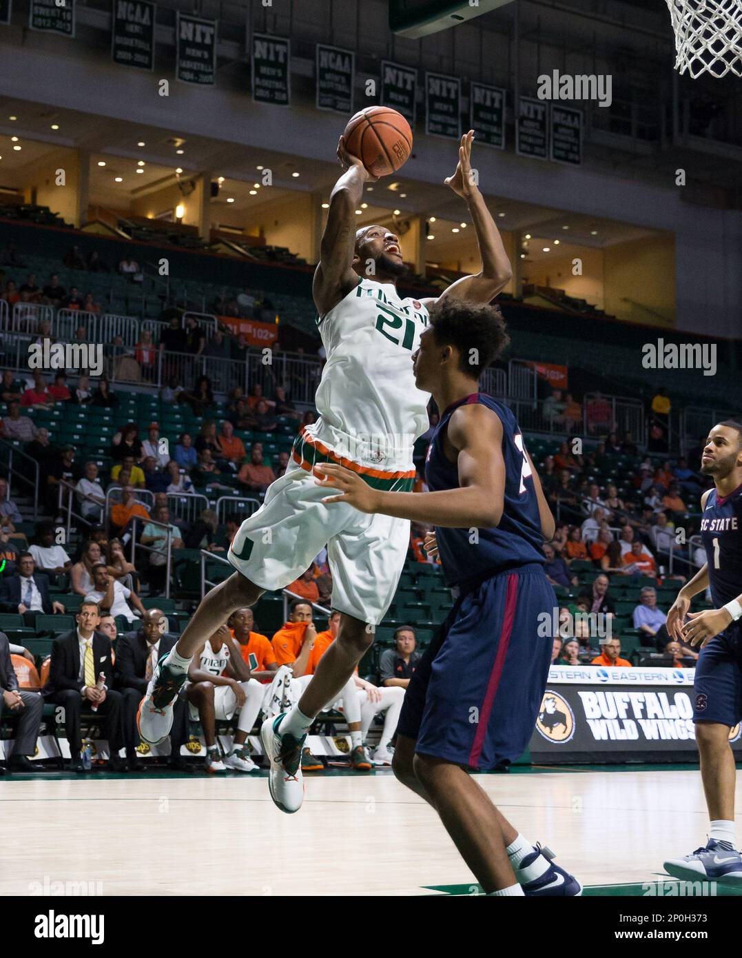 December 06, 2016: Miami Hurricanes forward Kamari Murphy (21) goes for ...