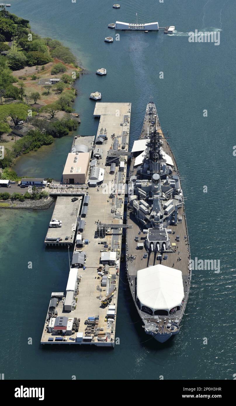 An aerial photo shows the USS Missouri (bottom) and the memorial ...