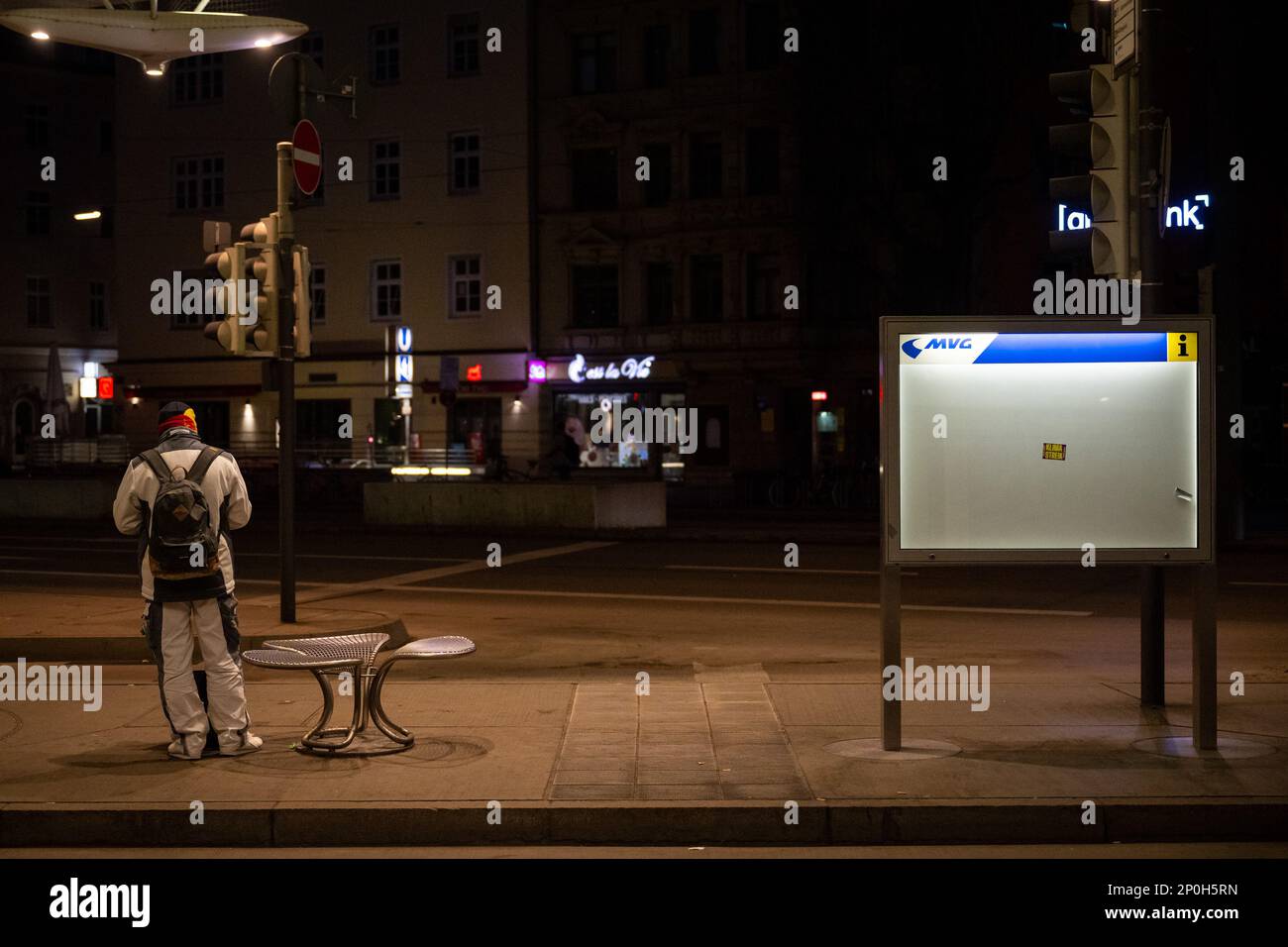 Munich, Germany. 03rd Mar, 2023. A man stands at the bus and streetcar ...