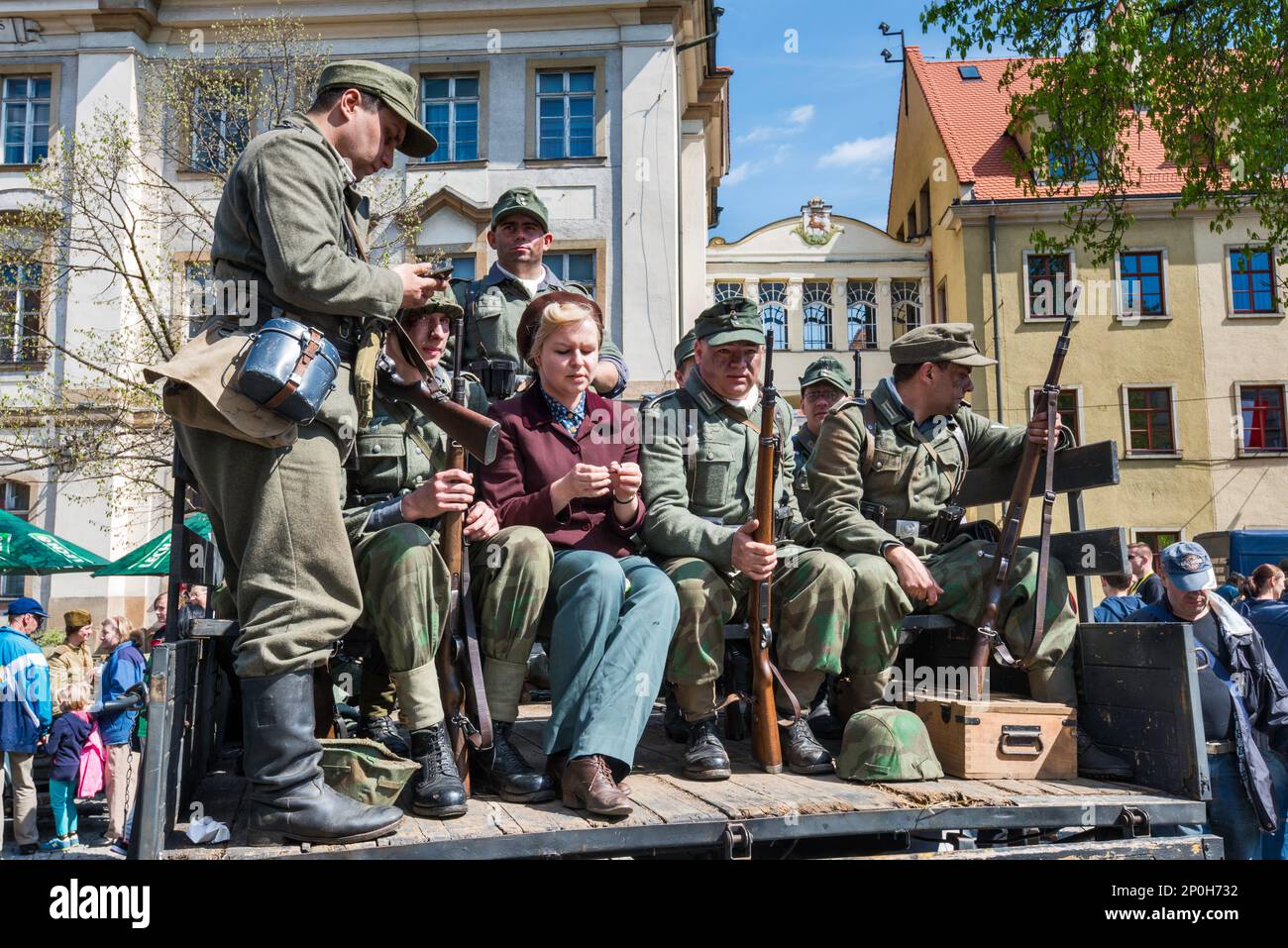 Reenactors, spectators, military vehicles, before reenactment of WW2 ... Reenactors, spectators, military vehicles, before reenactment of WW2 ...