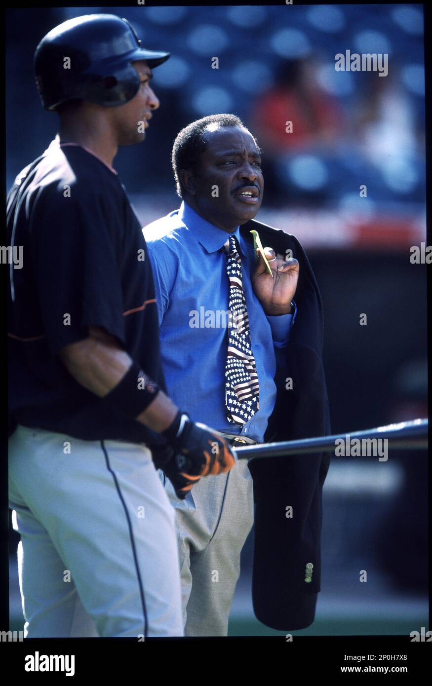 2002: Hall of Famer Joe Morgan and current ESPN announcer looks on ...