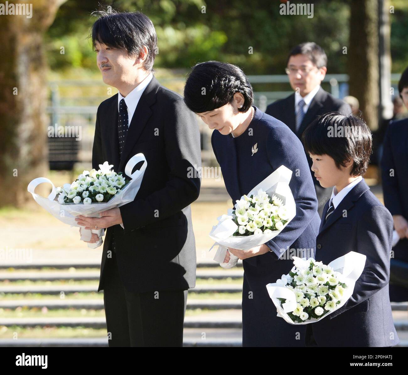 (L-R) Prince Akishino, Princess Kiko and their son, Prince Hisahito ...