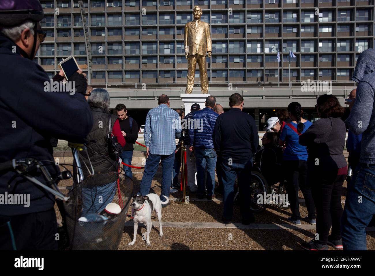 People watch a statue of Israeli Prime Minister Benjamin Netanyahu at a ...
