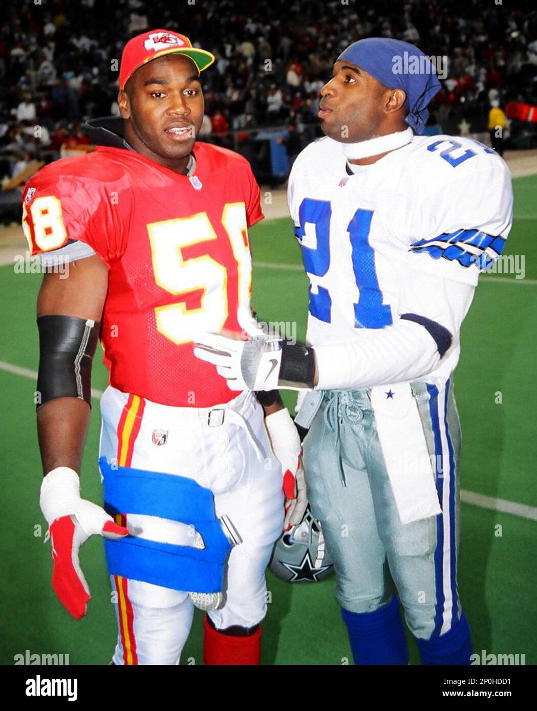 Derrick Thomas (58) Kansas City Chiefs and Deion Sanders (21) Dallas ...