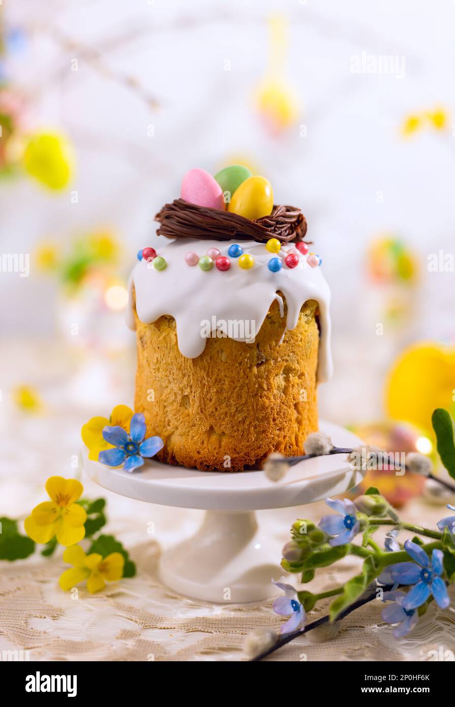 Traditional Easter Cake with chocolate nest and easter eggs candy ...