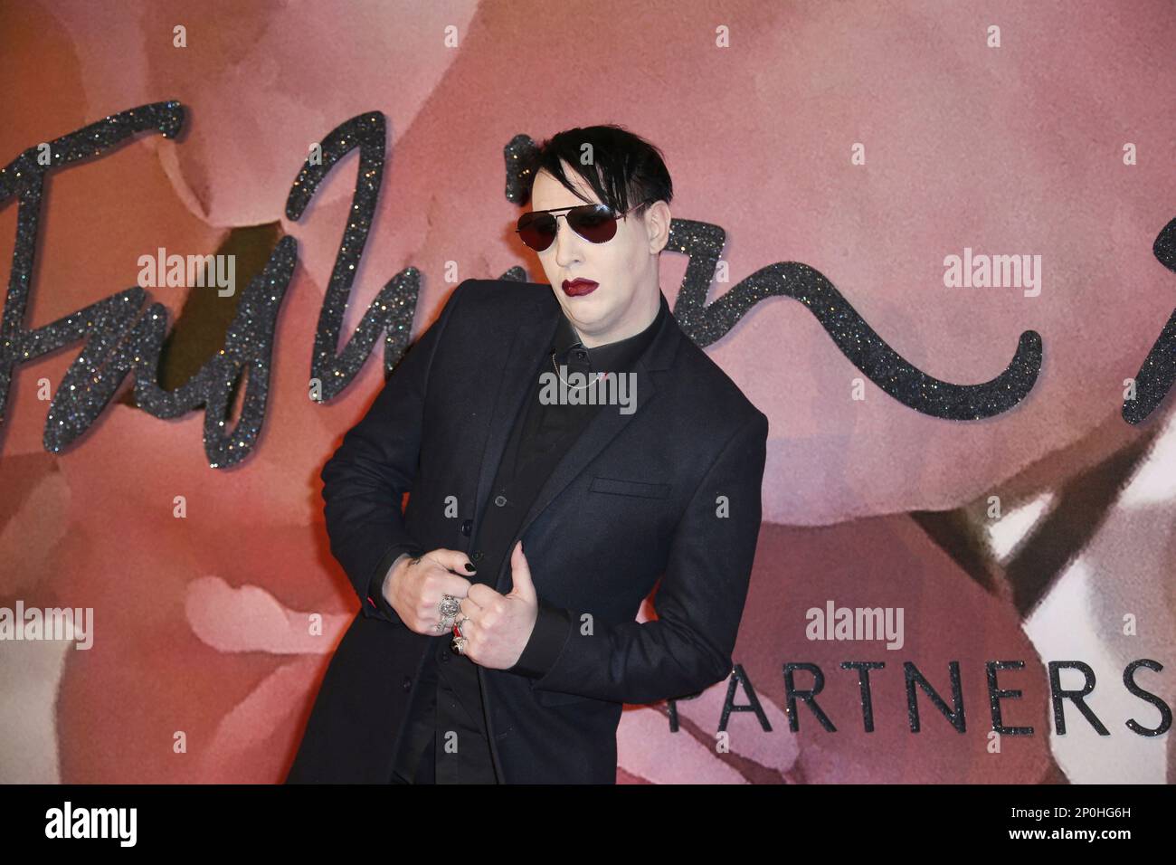 Singer Marilyn Manson poses for photographers upon arrival at the ...