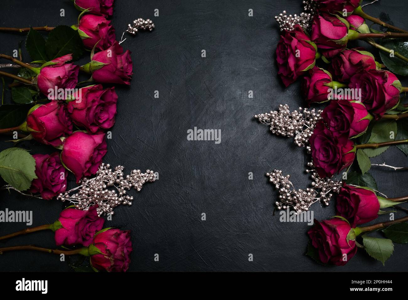 gothic wedding flowers burgundy roses arrangement Stock Photo - Alamy