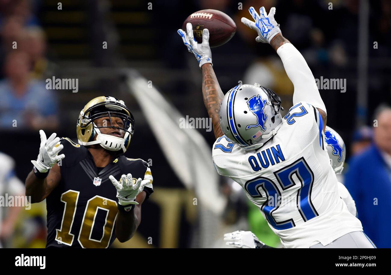 Detroit Lions free safety Glover Quin (27) tries to break up a pass ...