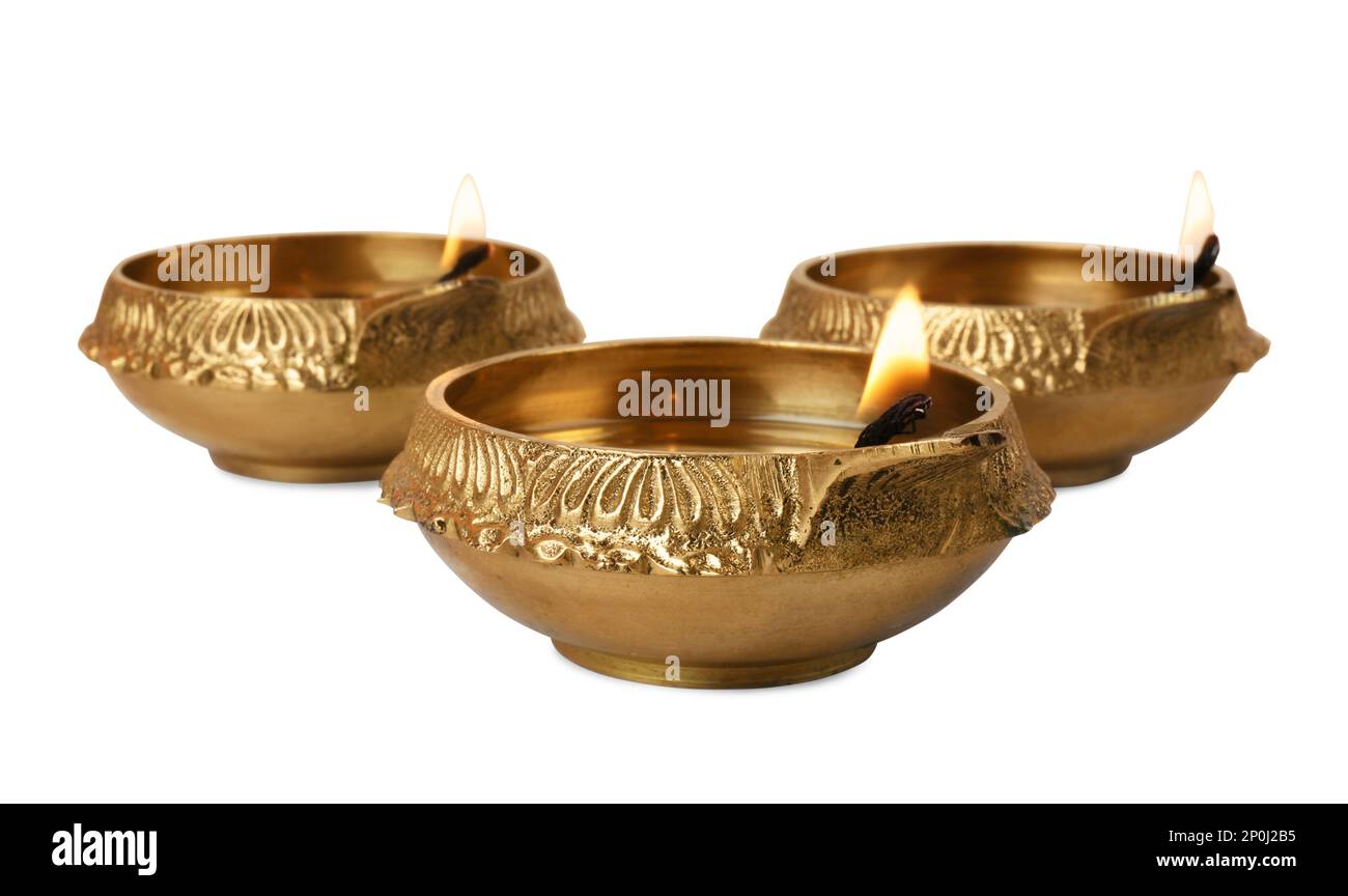 Lit diya lamps on white background. Diwali celebration Stock Photo - Alamy